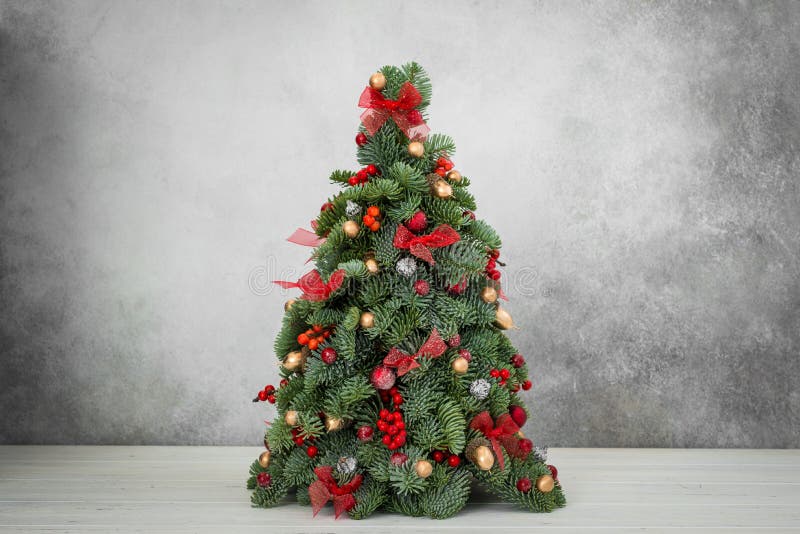 Christmas Tree on a Grey Background with Copy Space. Image for Cards ...