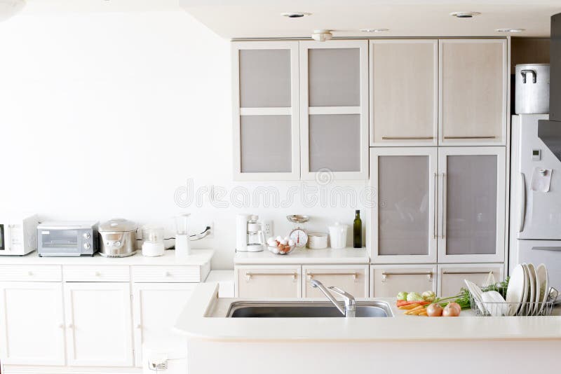 A Bright, Clean White Kitchen with a Compact Stock Image - Image of ...