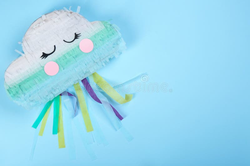 Bright Cloud Pinata on Light Blue Background, Top View. Space for Text ...