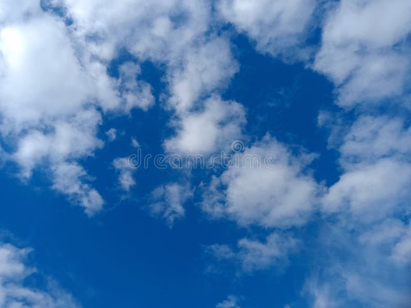 Bright clouds stock photo. Image of wind, sunlight, blue - 304159460