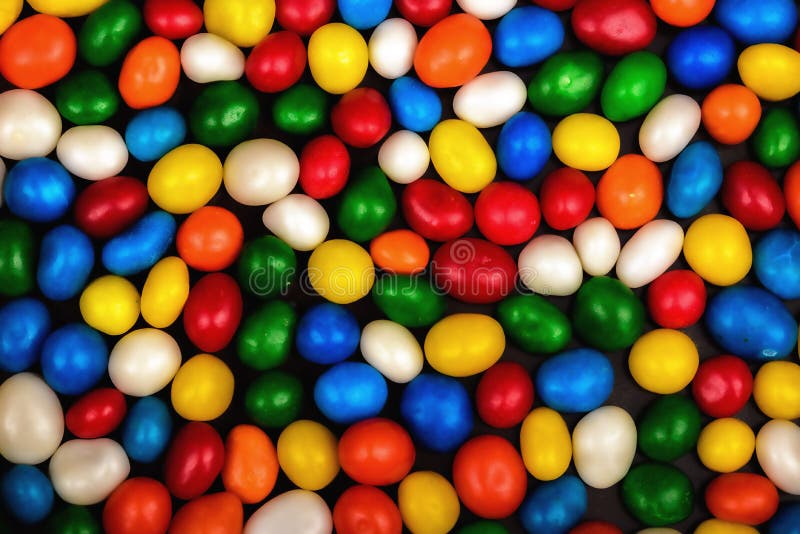 Bright colored candies stock image. Image of descriptive - 21981335