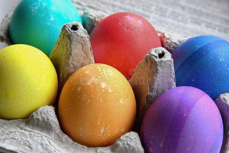 Bright Colored Easter Eggs in an Egg Carton Stock Photo - Image of ...
