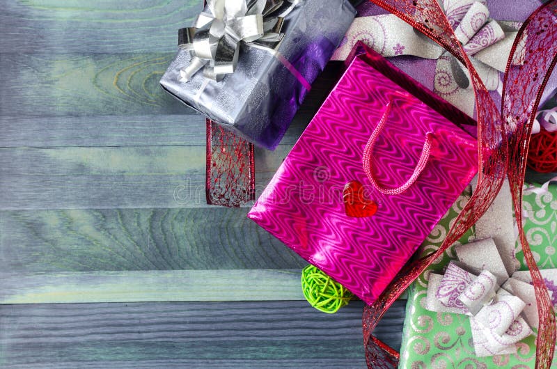 Bright Colored Gift Boxes and Decorative Elements on a Wooden ...