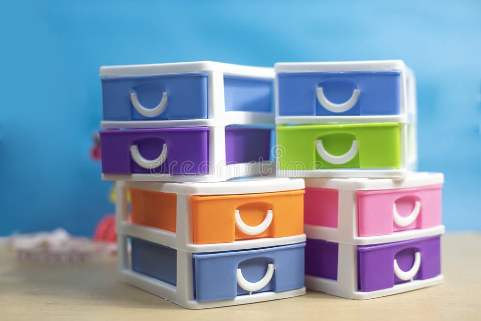 Bright Colored Plastic Drawers, Blue Wall Face Stock Illustration ...