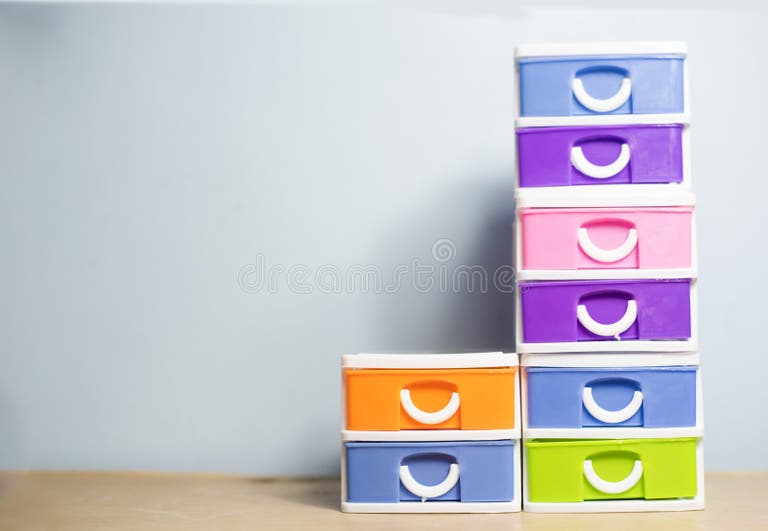 Bright Colored Plastic Drawers, Light Blue Wall Face Stock Photo ...