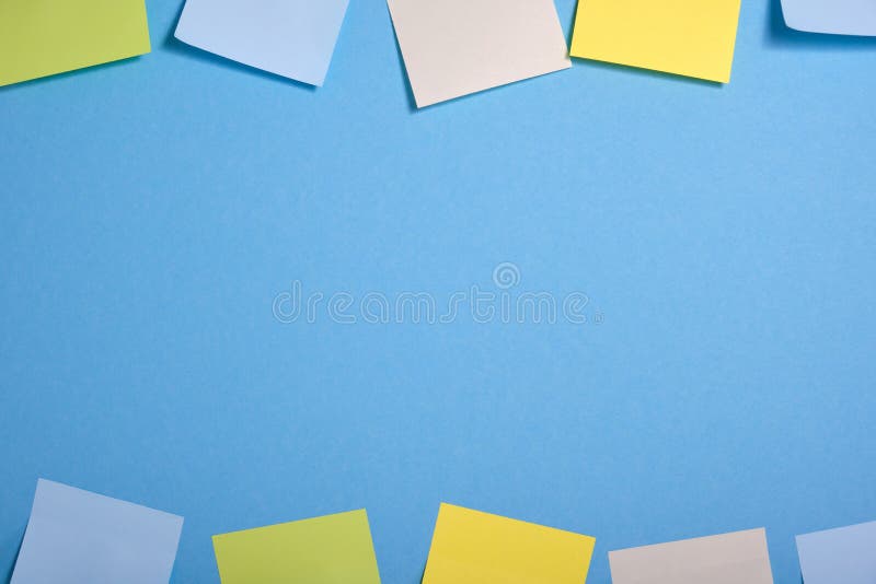 Colored Sticky Notes on Blue Background Stock Photo - Image of ...