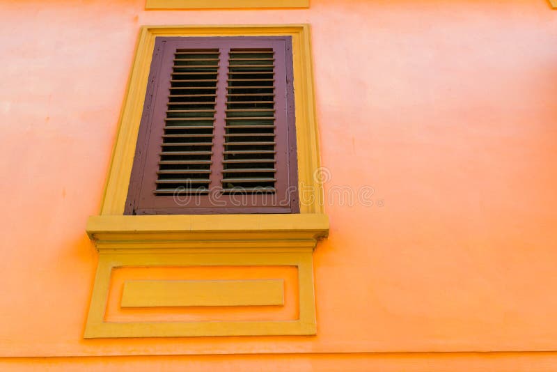 Bright Colored Wall with Windows on the Medieval Streets Stock Photo ...