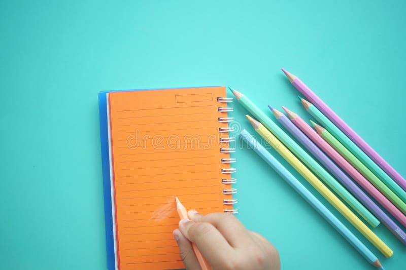 Bright Colors and Creativity in a Workspace with Notepad and Pencils ...