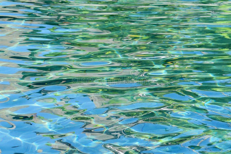 Bright Colors Swimming Pool Water Surface with Sky Reflection Stock ...