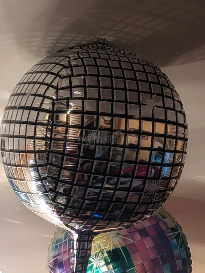 Disco Ball Style Helium Balloon Stock Photo - Image of looking, ceiling ...