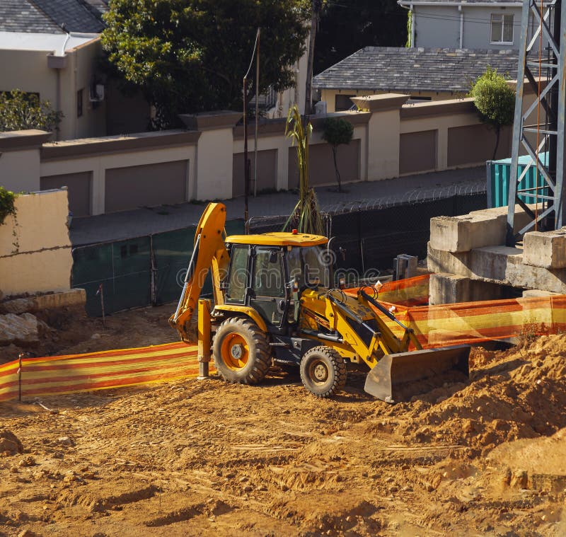 Bright Compact Backhoe Loader on the Surface Preparation of ...