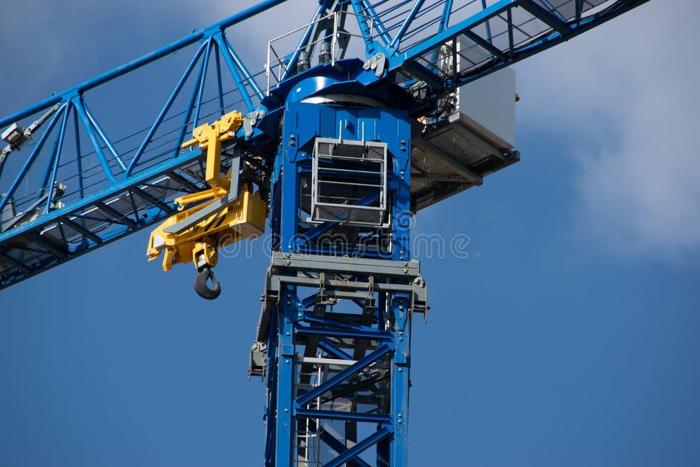 Bright Construction Crane with Blue Background and Operator Booth Stock ...