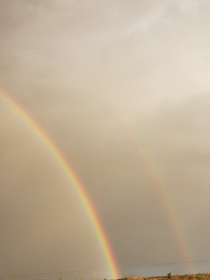 Bright Double Rainbow during the Storm Stock Photo - Image of bright ... Bright Double Rainbow during the Storm Stock Photo - Image of bright ...