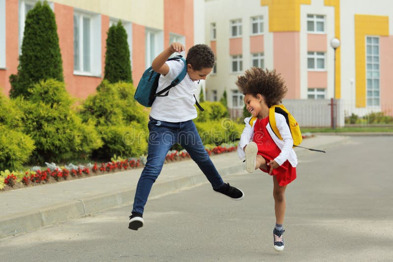 Bright Emotions of Two Black Children Running Back To School Stock ...