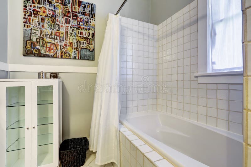 Empty Bathroom in Soft Ivory Color with Tile Wall Trim Stock Image ...