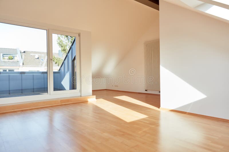 Bright Empty Room in the Attic with Balcony and Parquet Stock Photo ...