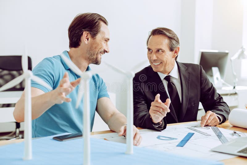 Cheerful Elegant Man Communicating with a Skilled Engineer Stock Image ...