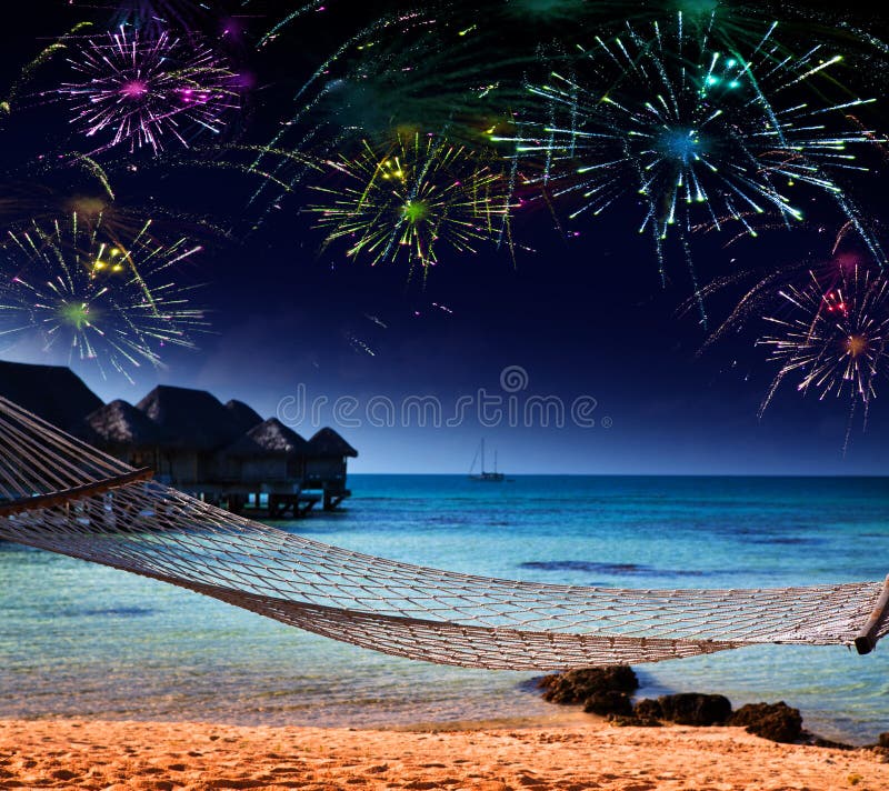 Bright Festive Fireworks Over the Sea and the Beach Stock Image - Image ...
