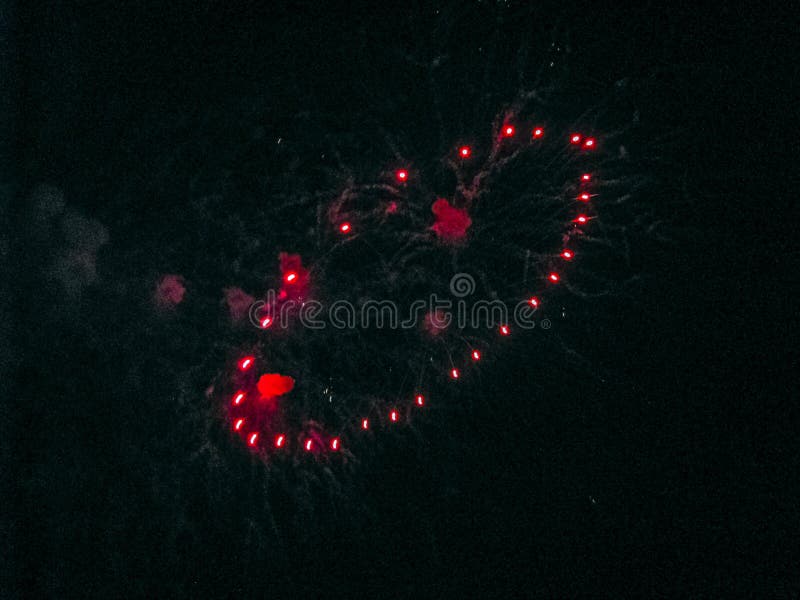 A Bright, Fiery, Red Ellipse from Fireworks before the Explosion Formed ...