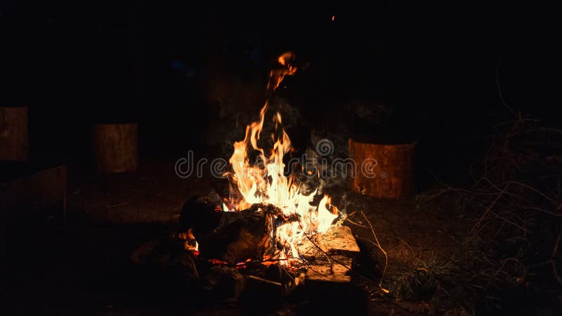 Bright fire with smoke stock photo. Image of glow, midnight - 207812214