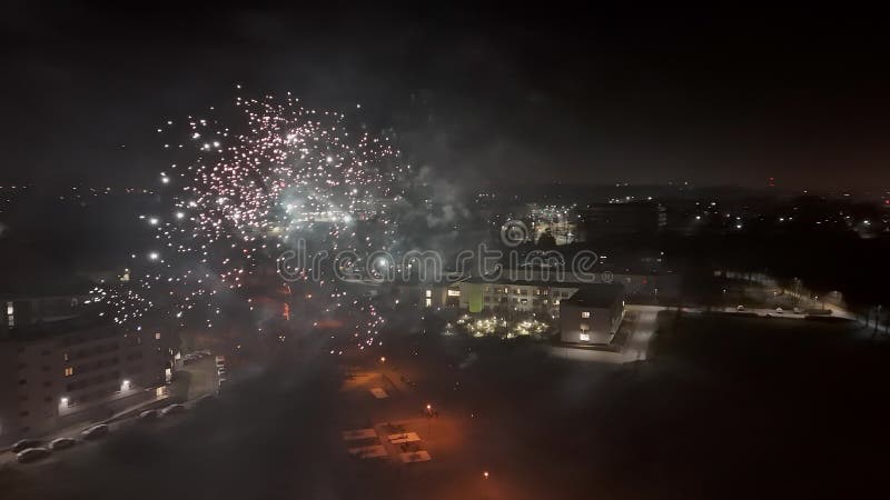 Bright Fireworks Exploding Over a City at Night, Large Colorful ...