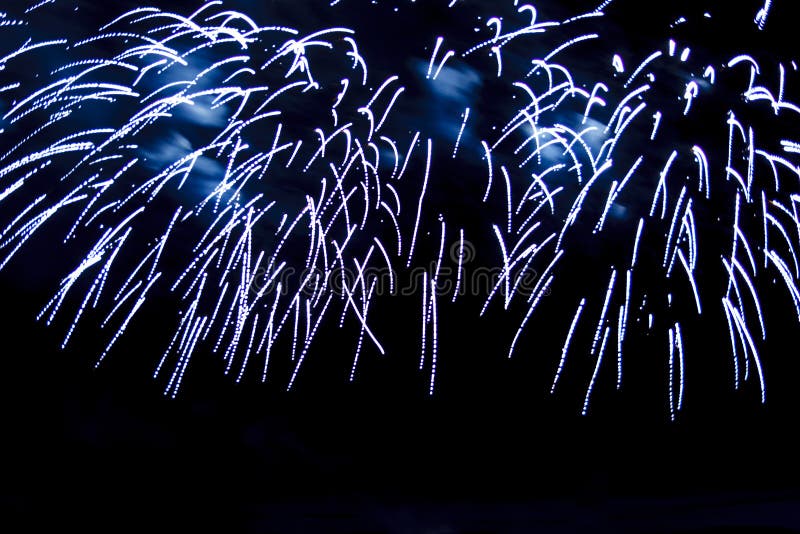 Bright Fireworks Scattering of Sparks of Blue Color. Stock Image ...