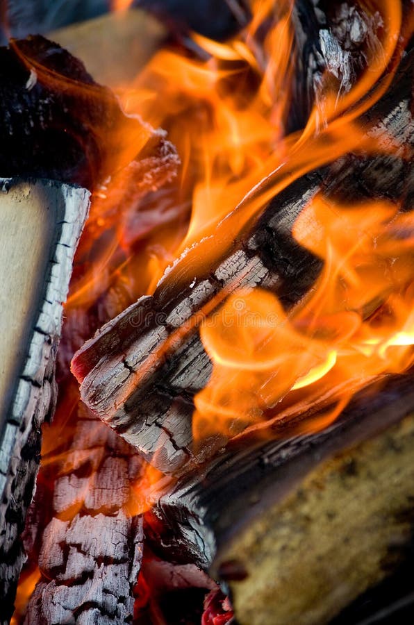 Bright Flame in the Fire with Firewood. Selective Focus Stock Image ...