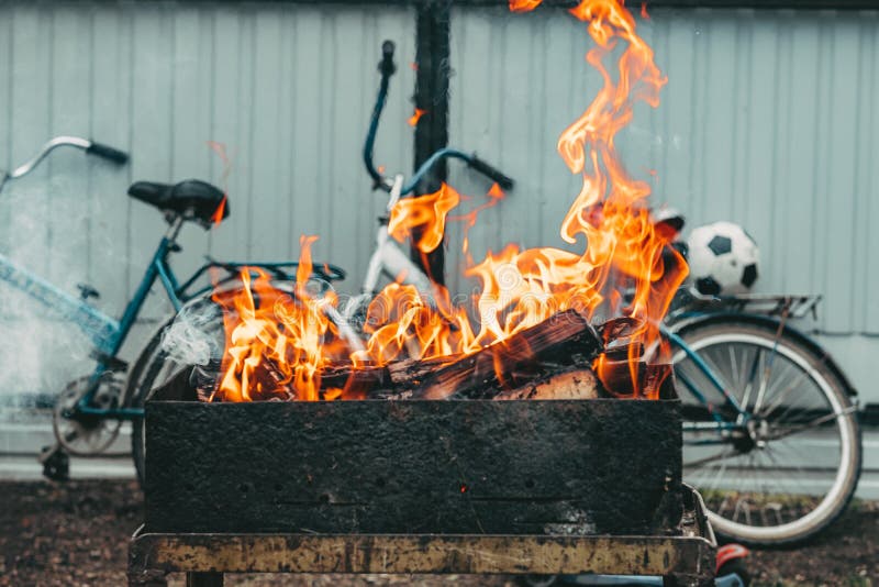 A Bright Flame from the Fire. Flames Over Barbecue Stock Photo - Image ...