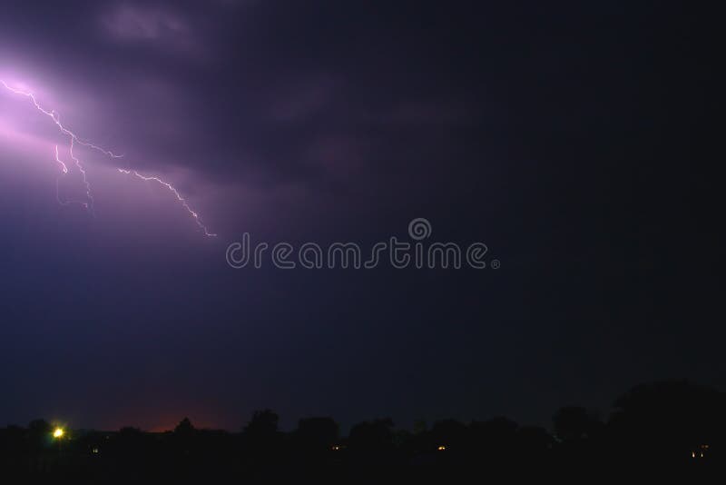 Flash of Lightning in the Night Sky Color it in an Incredibly Beautiful ...