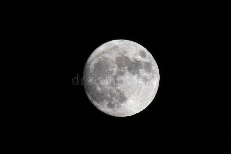 Bright Full Moon Illuminates a Clear Night Sky Stock Photo - Image of ...