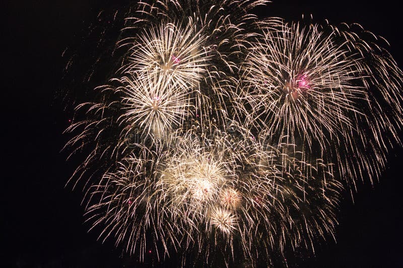 Fireworks Exploding Over the Ocean at Night Stock Photo - Image of ...