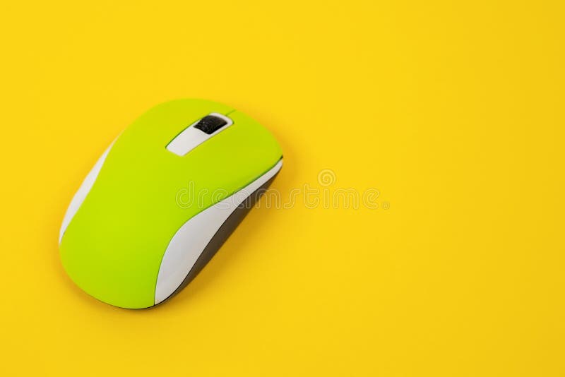 The Bright Green Computer Mouse on Yellow Background. Isolated, Studio ...