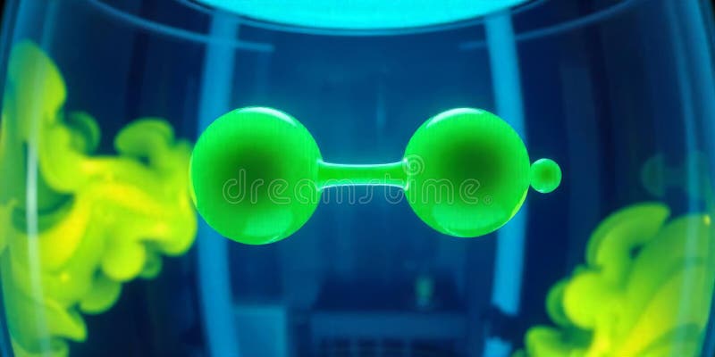 Bright Green Molecular Model Floating in Liquid with Vibrant Colors in ...