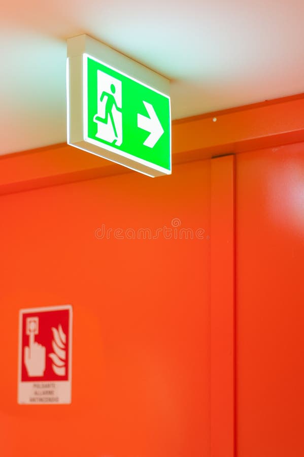 Bright Green Safety Exit Signal. Stock Photo - Image of output, flame ...