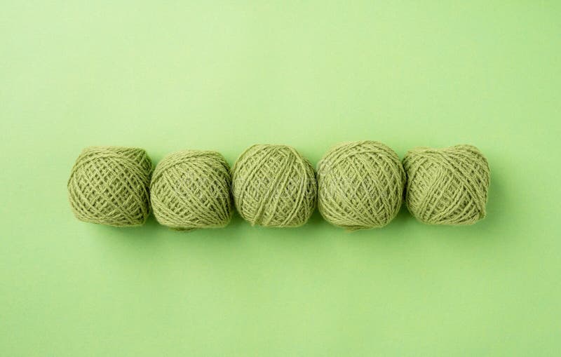 Bright Green Yarn Wool in a Raw on Bright Background, Top View Flat Lay ...
