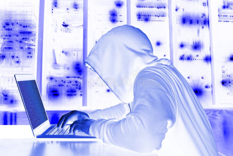Bright Hooded Hacker in a Server Room Analysing Data Stock Photo ...