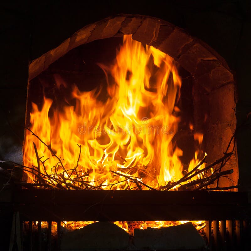 A Bright and Hot Flame in the Opening of a Stone Fireplace Stock Photo ...