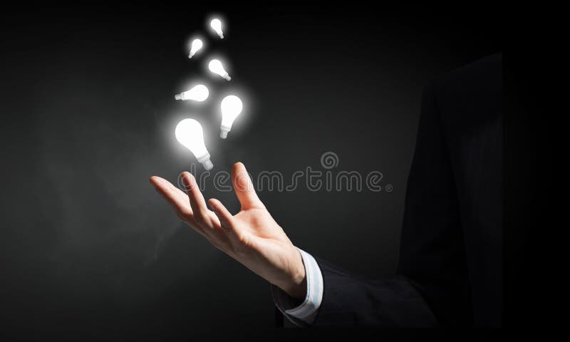 Bright idea in hand stock image. Image of creativity - 63704259