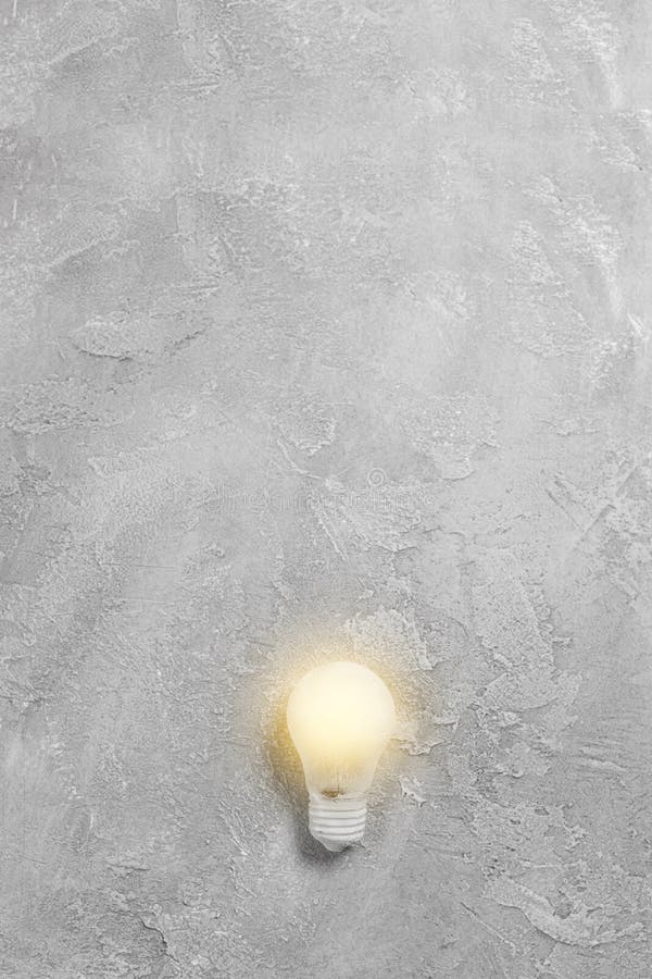 Bright Idea Illuminated Light Bulb on Grey Background. Creative ...