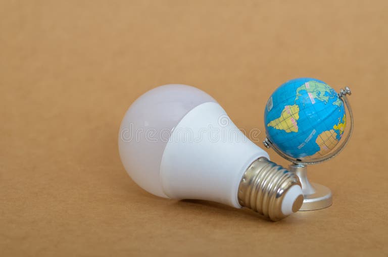 Bright Ideas for a Better World: Light Bulb and Globe Concept Stock ...