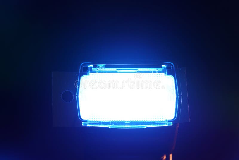 Bright Illuminated Flashing Blue Light on a Dark Background Stock Image ...