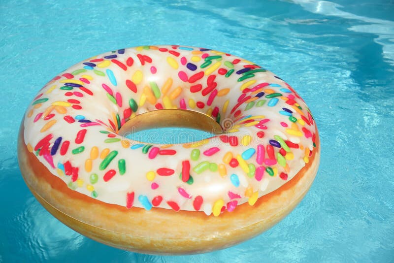 Bright Inflatable Doughnut Ring Floating in Swimming Pool Stock Photo ...