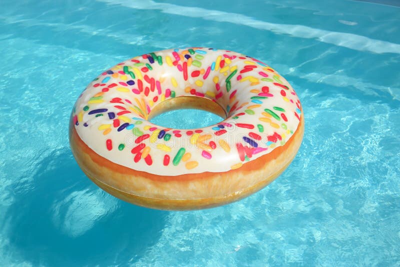 Bright Inflatable Doughnut Ring Floating in Swimming Pool Stock Photo ...
