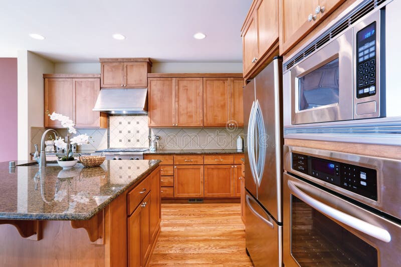 Bright Inviting Kitchen Features Granite Counters. Stock Photo - Image ...