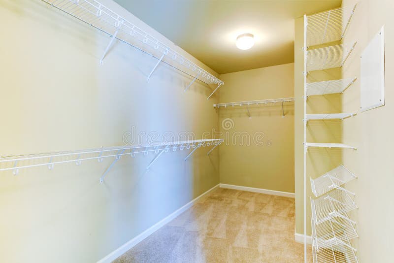 Bright Ivory Walk-in Closet Stock Photo - Image of real, interior: 43844836