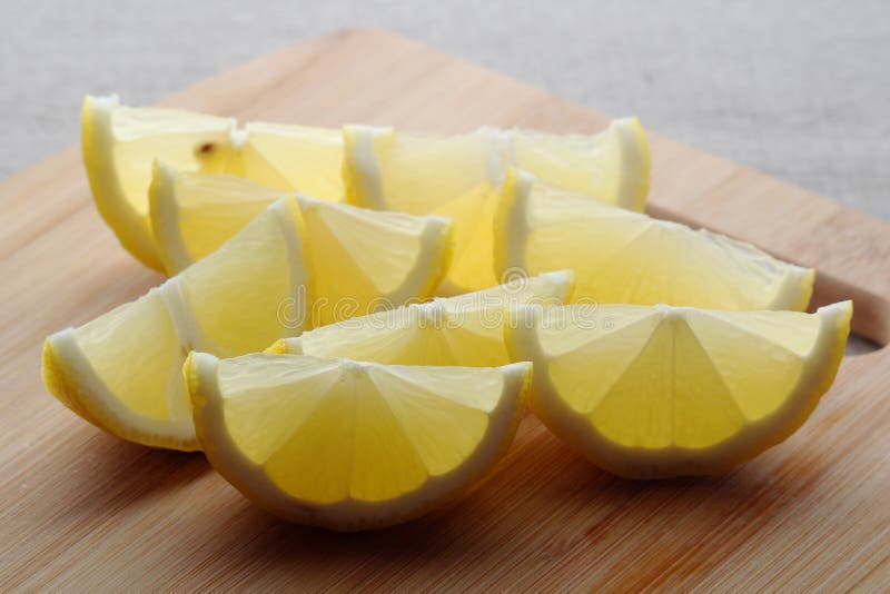 Segments of Lemon in Counter Light Stock Image - Image of pieces ...