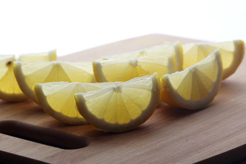 Segments of Lemon in Counter Light Stock Photo - Image of cutout, fresh ...