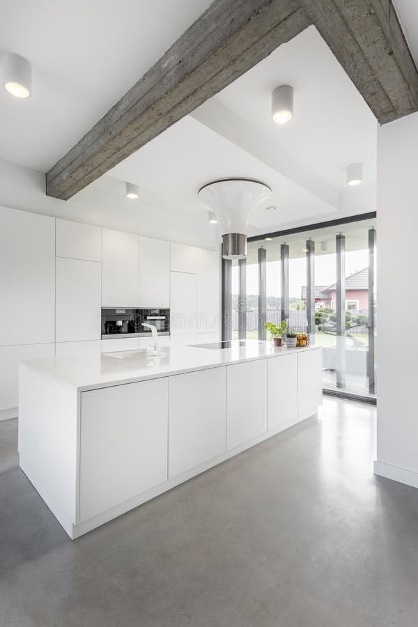 Kitchen Area with Paneled Ceiling and Hardwood Floor Stock Image ...