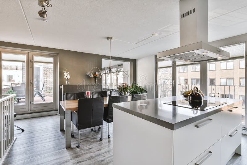 Bright kitchen design stock photo. Image of table, sink - 230083168