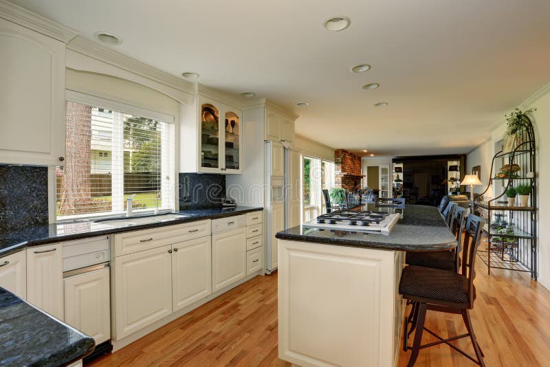Bright Kitchen Room Interior with White Cabinets and Kitchen Island ...